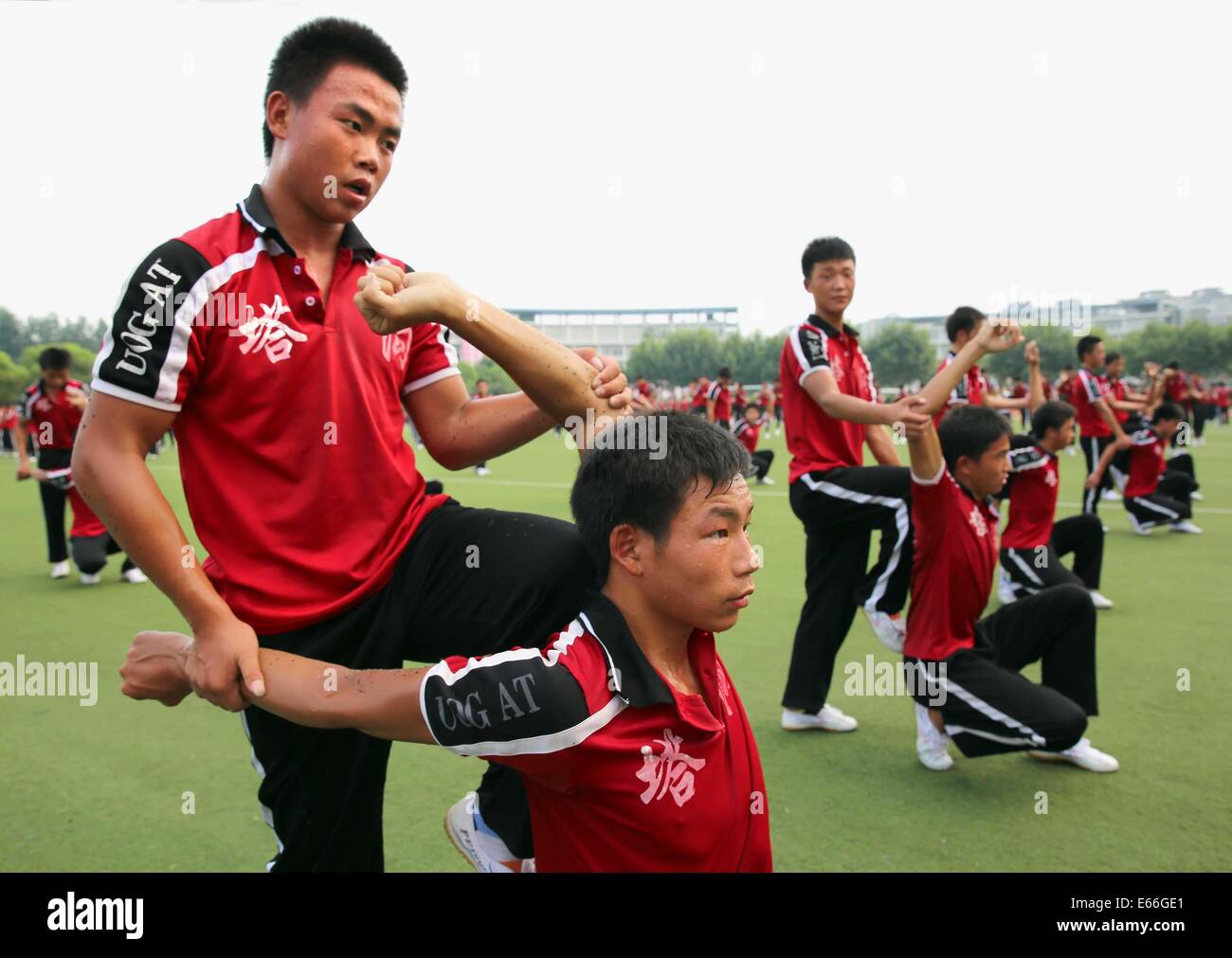 Nanjing, China. 15th Aug, 2014. Young performers from Songshan Shaolin ...