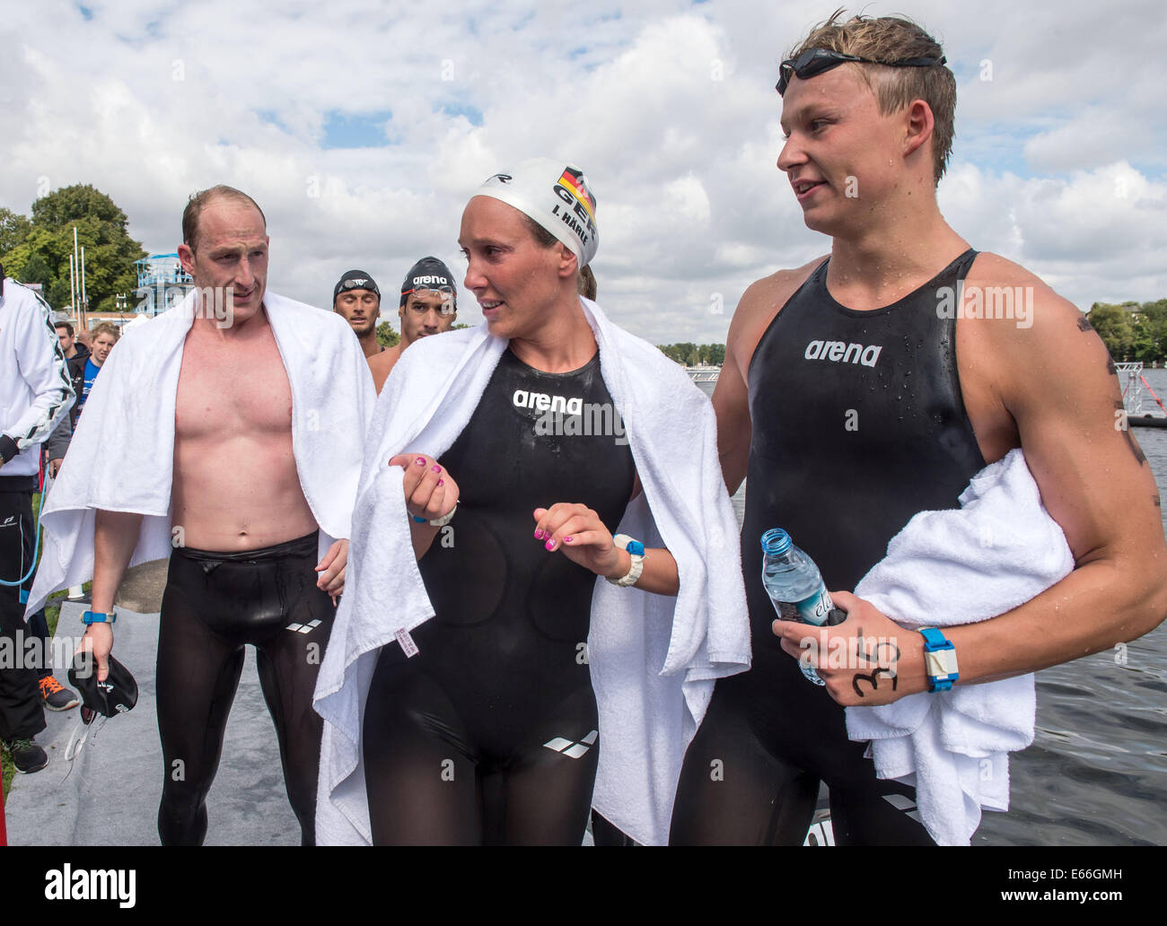 Berlin, Germany. 16th Aug, 2014. Isabelle Haerle (C), Rob Muffels and ...