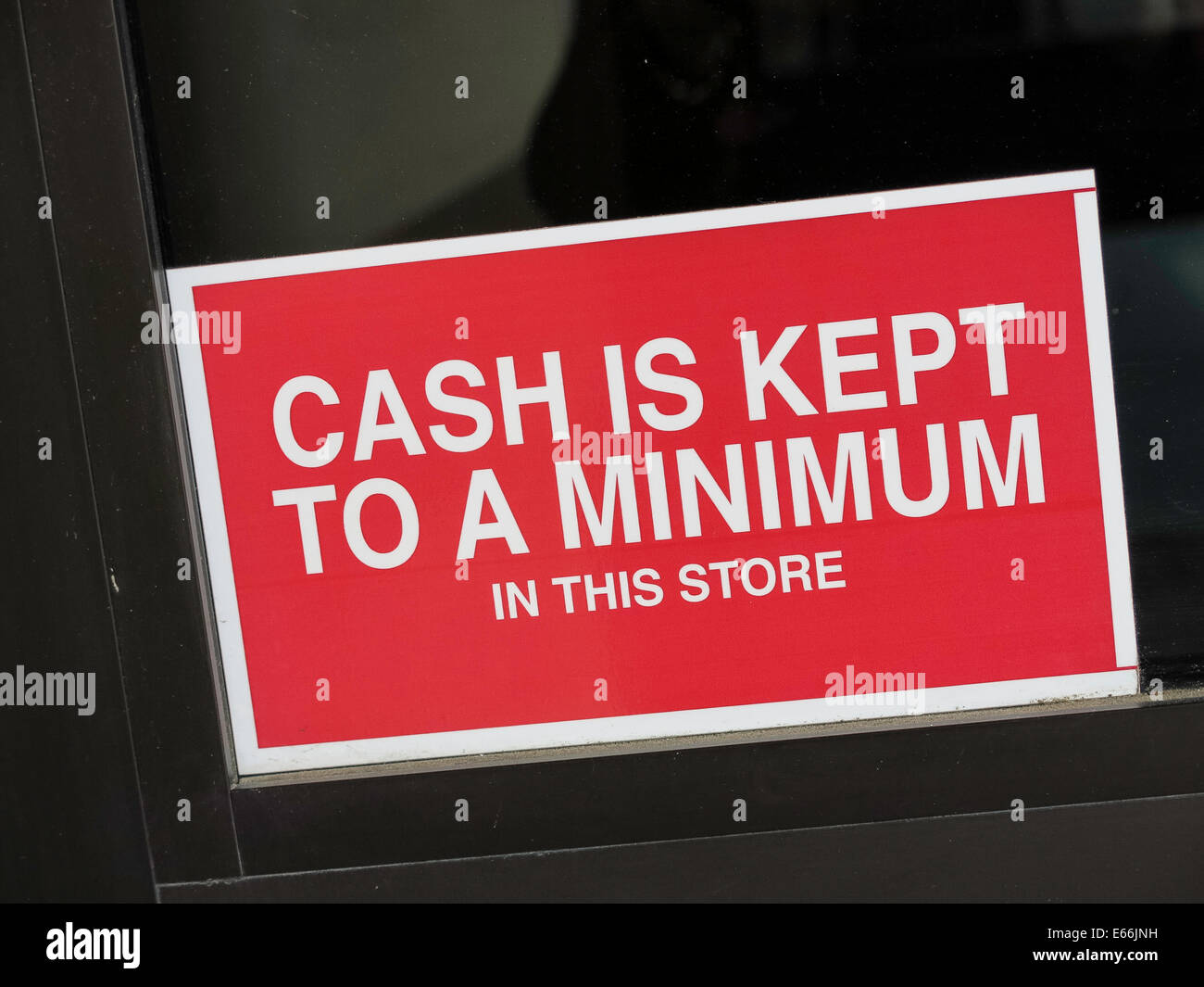 Cash is Kept to a Minimum Sign Stock Photo - Alamy