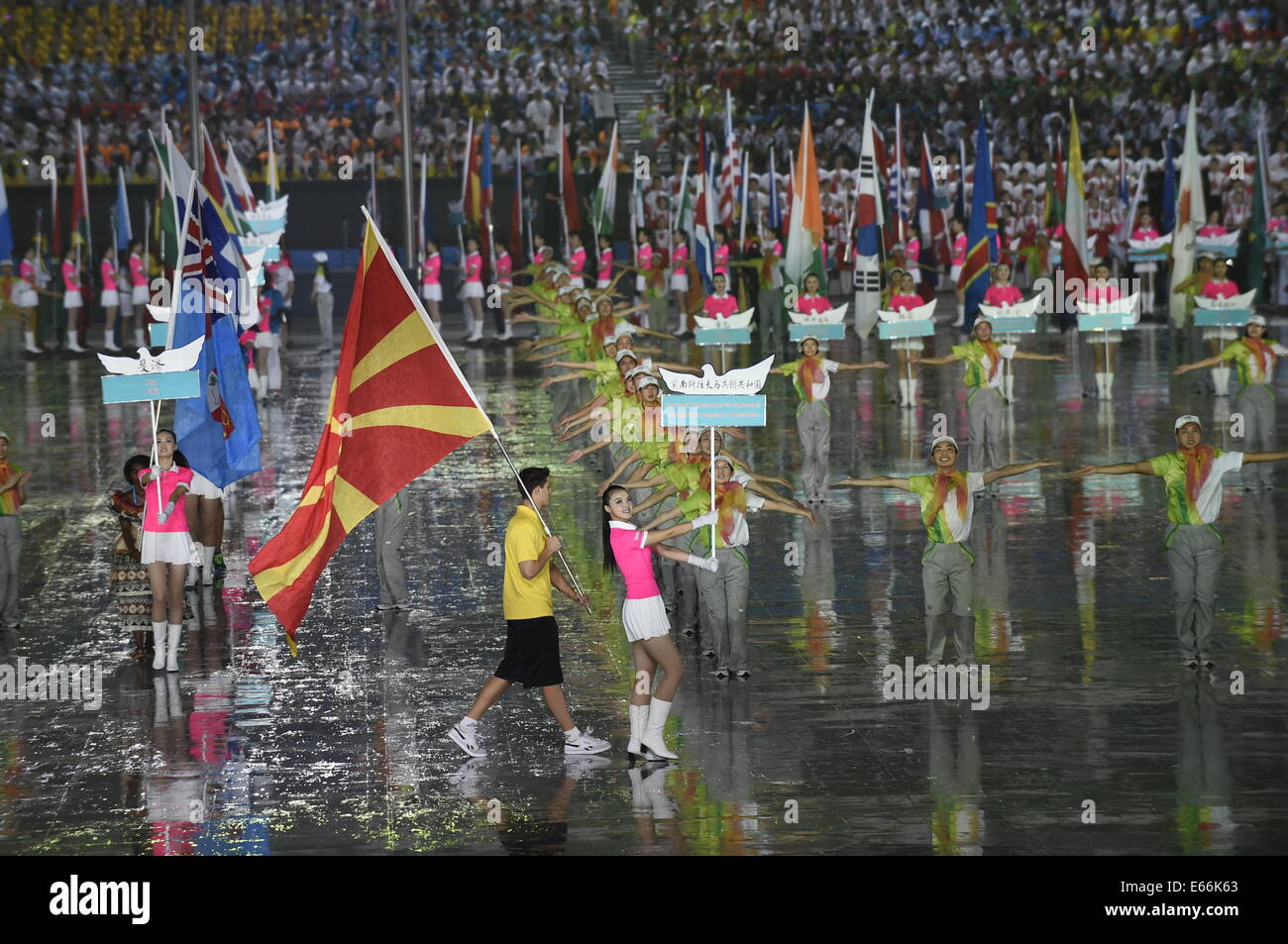 Nanjing, China's Jiangsu Province. 16th Aug, 2014. The flag bearer of ...