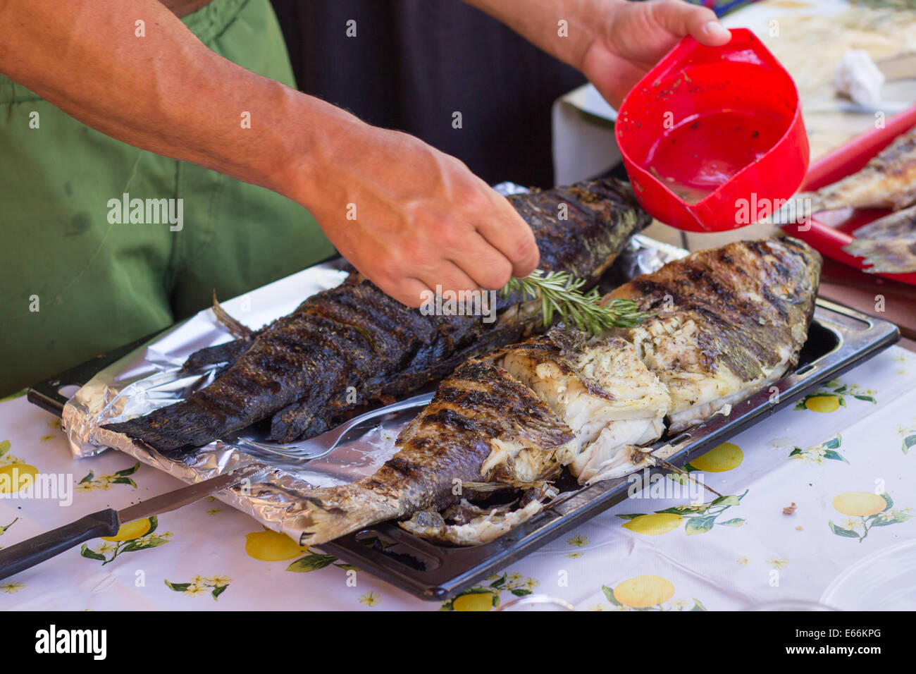 man preparing cooking fish hands closeup table Stock Photo - Alamy