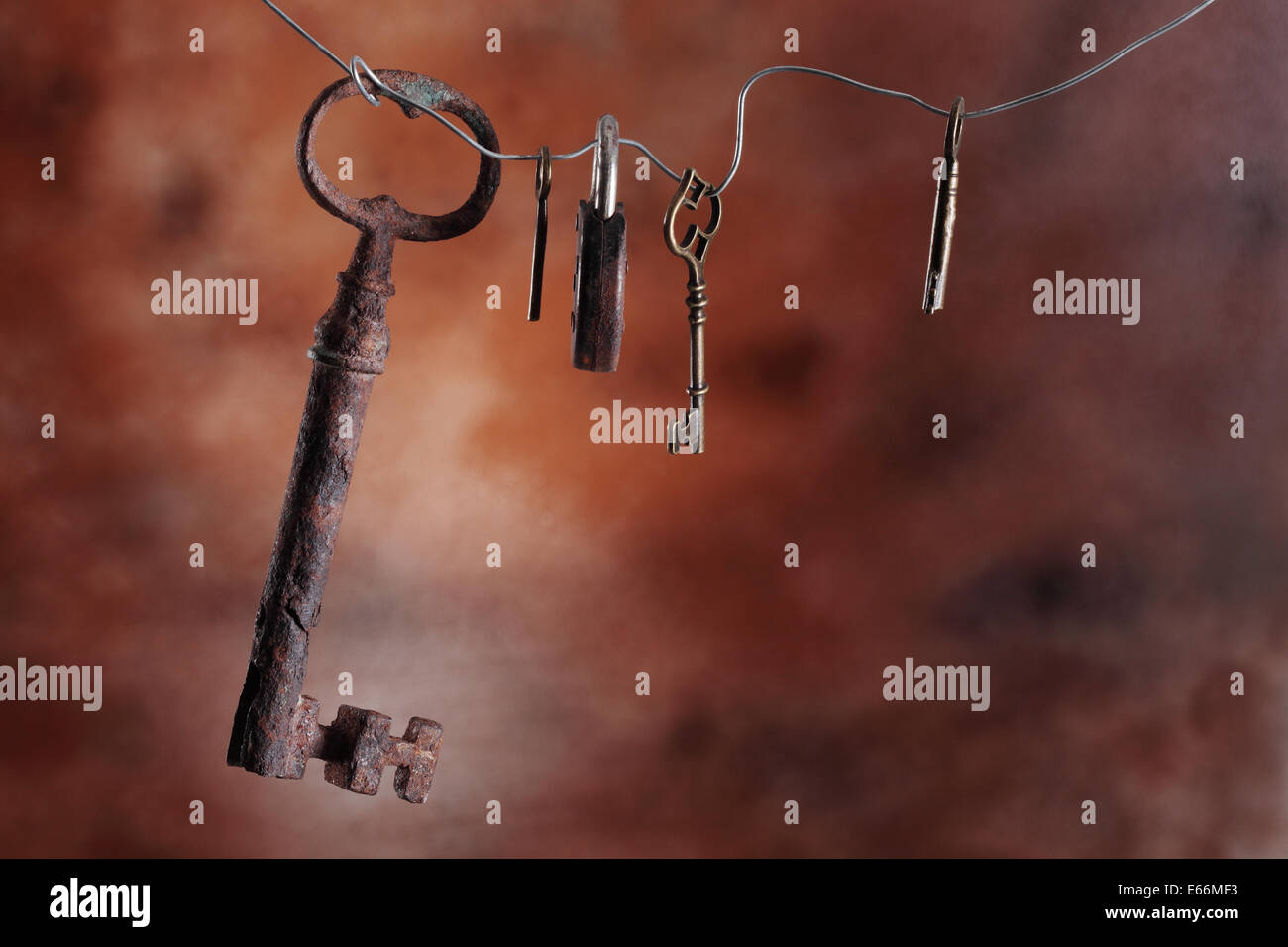 picture of an old keys on a brown background Stock Photo - Alamy