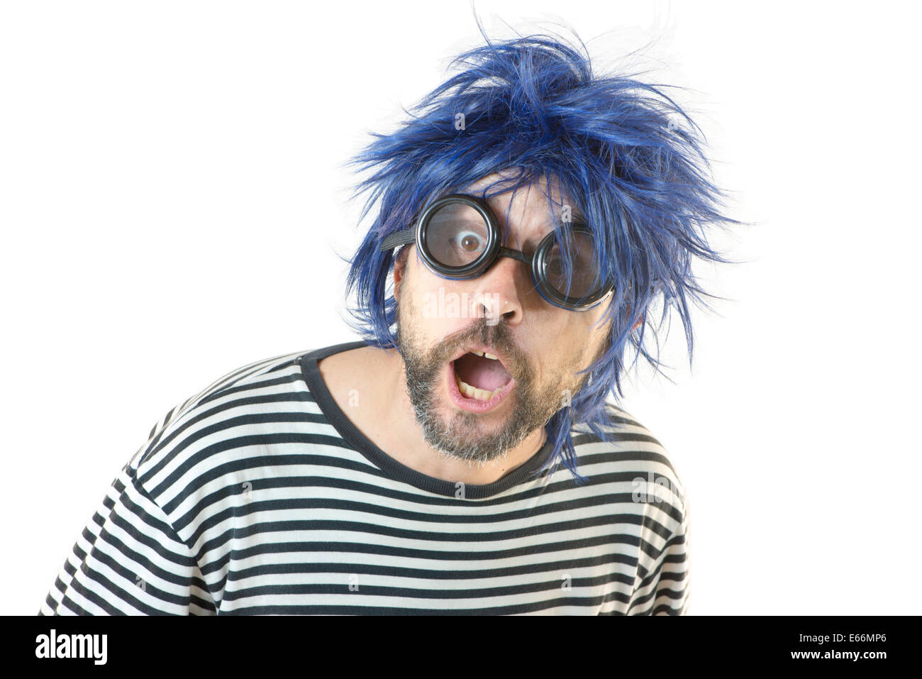 A bizarre man, amazed, looking at the camera, isolated over white ...