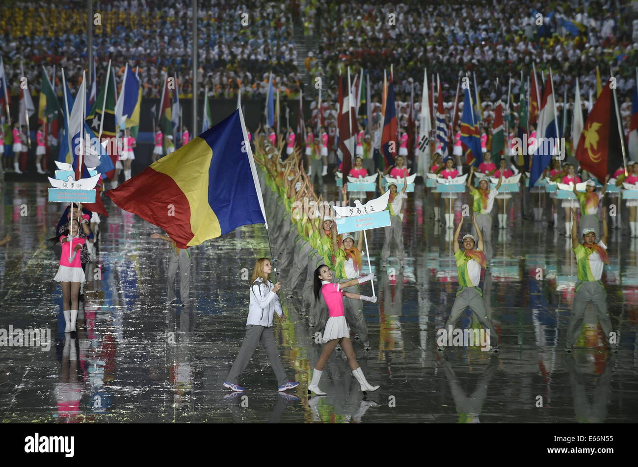 Nanjing, China's Jiangsu Province. 16th Aug, 2014. The flag bearer of ...