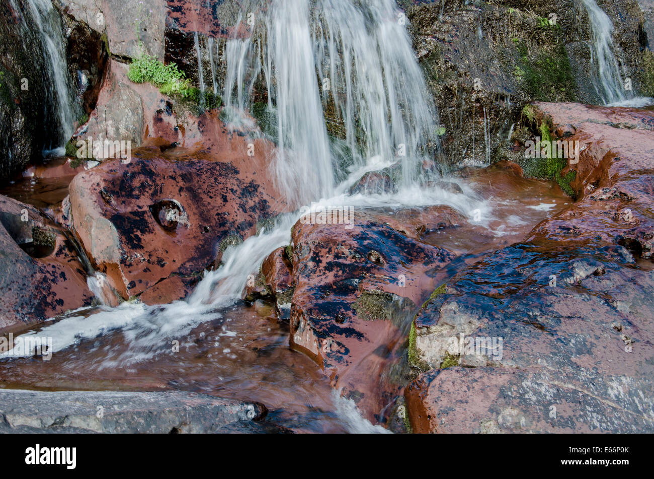 Small cascade on the river Stock Photo - Alamy