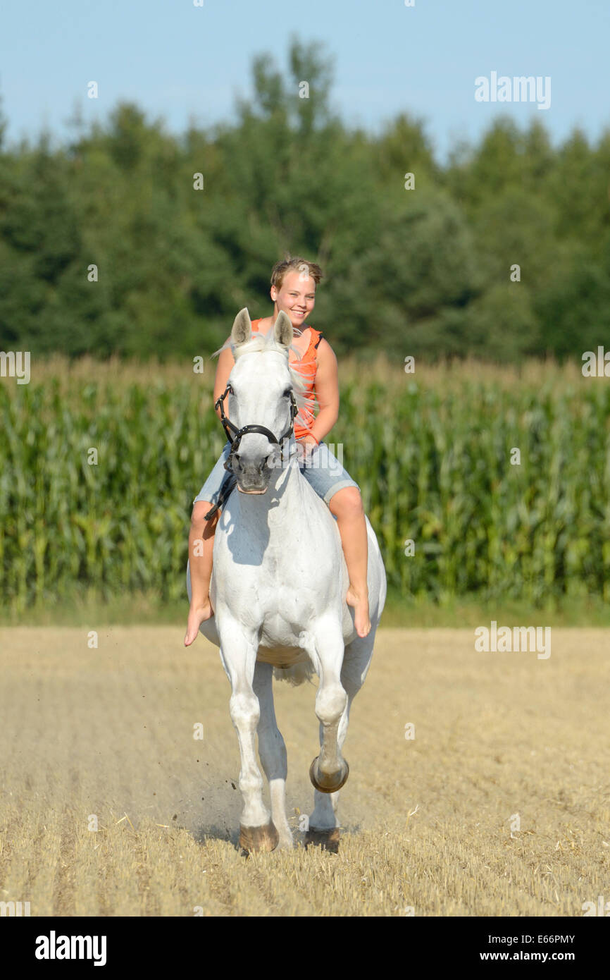 Young woman riding bareback on hi-res stock photography and images - Alamy