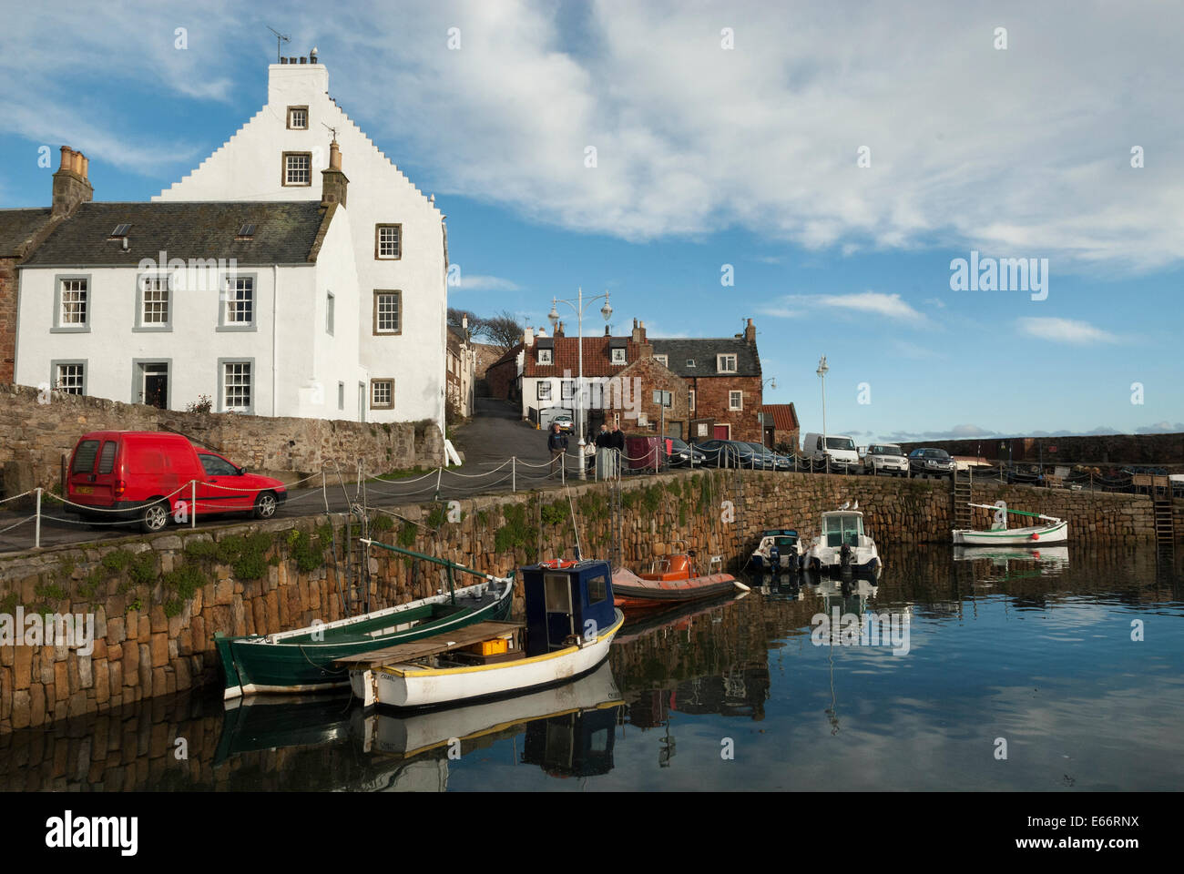 Red fishing boats hi-res stock photography and images - Alamy