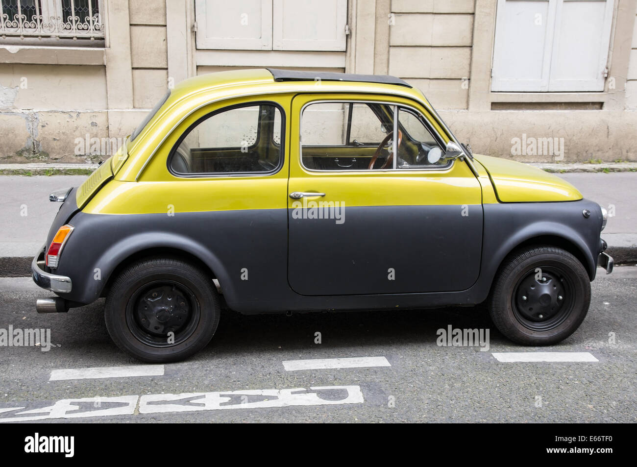 Vintage Fiat 500 car parked on the street in Paris, France Stock Photo ...