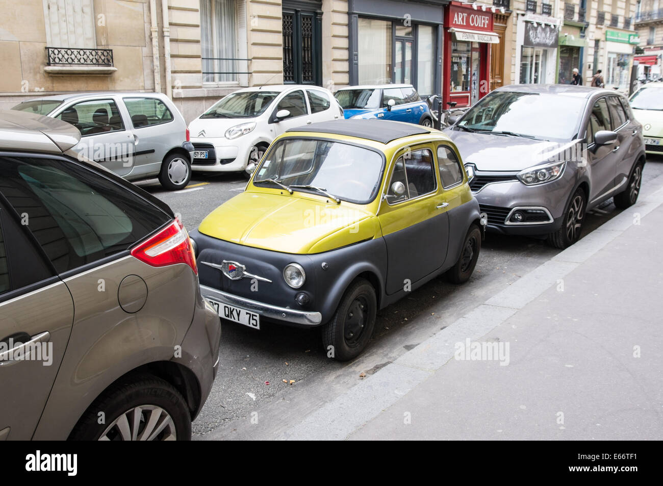 Vintage Fiat 500 car parked on the street in Paris, France Stock Photo ...
