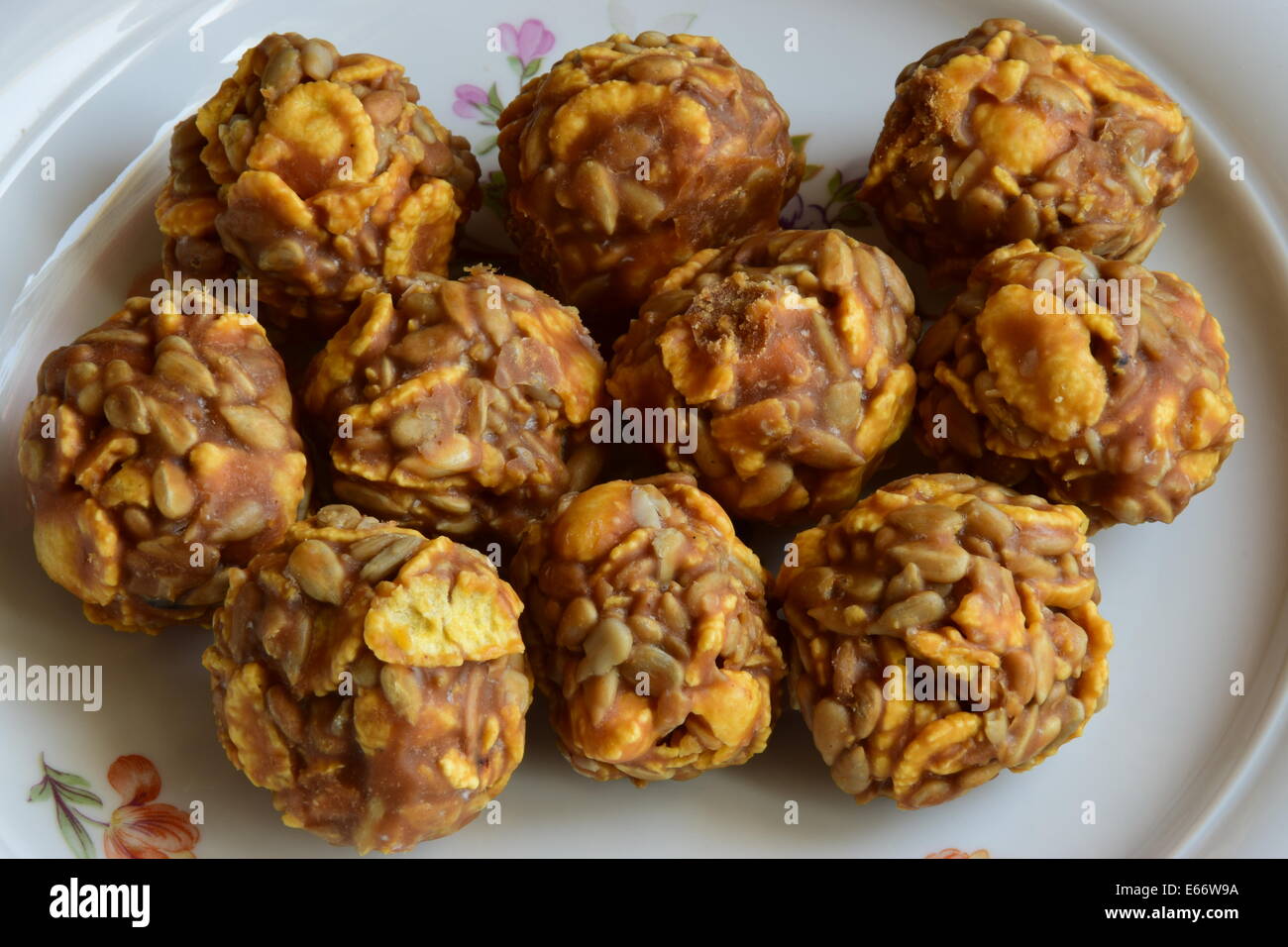 Sweet round spheres made of nugat and flakes Stock Photo - Alamy
