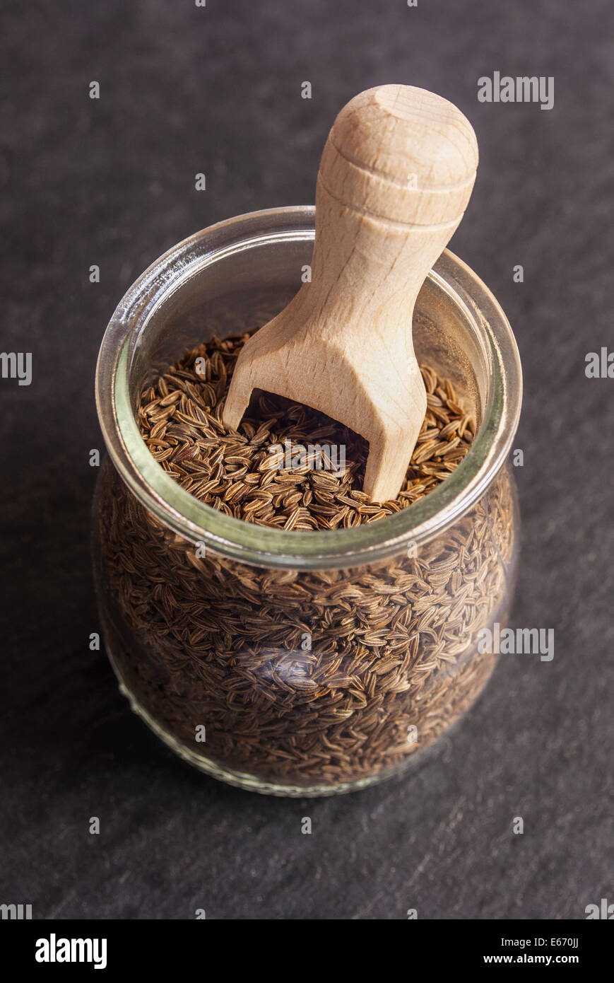 cumin seeds on black background Stock Photo - Alamy