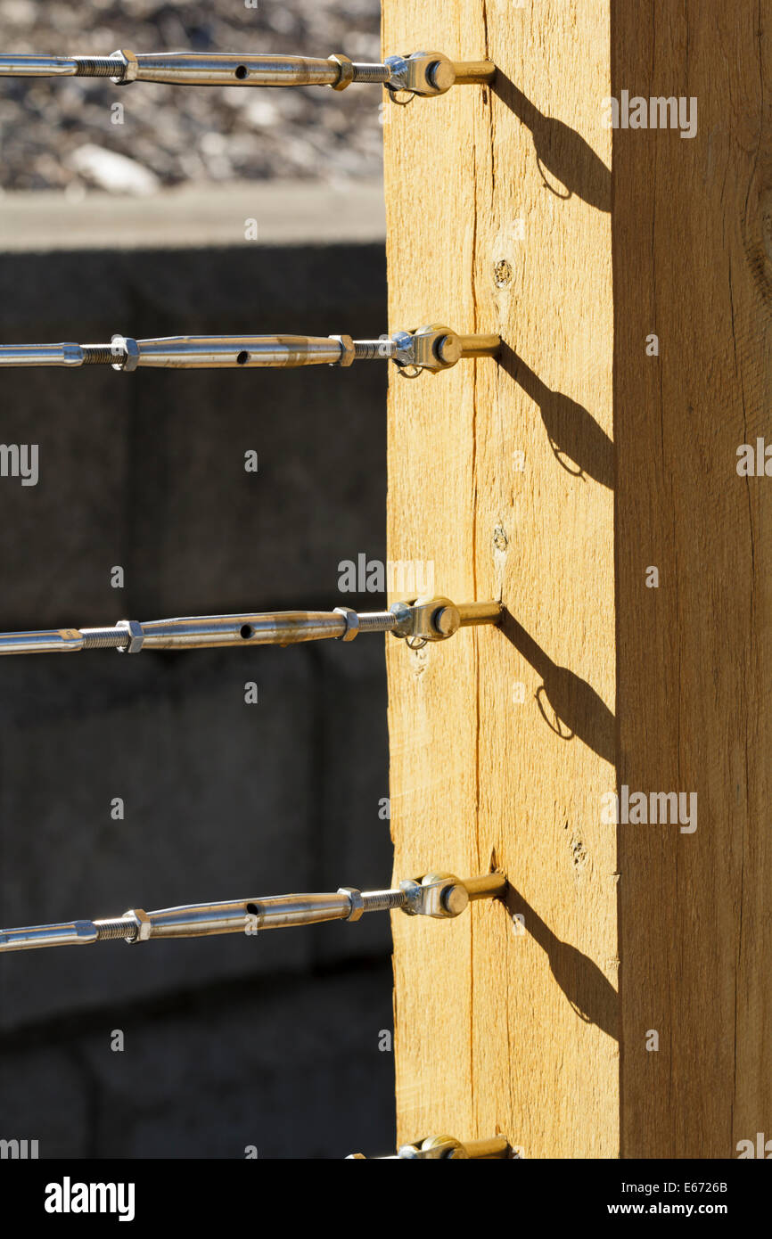 Tension Wire Fence Wooden Post High Resolution Stock Photography and ...