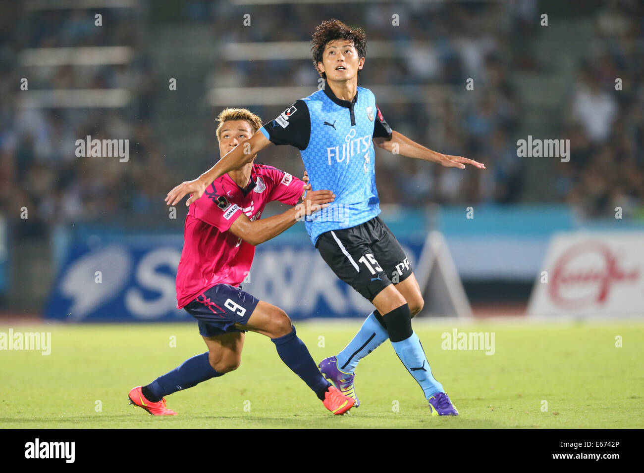 Kawasaki Todoroki Stadium, Kanagawa, Japan. 16th Aug, 2014. (L-R) Ryo Nagai (Cerezo), Shogo ...