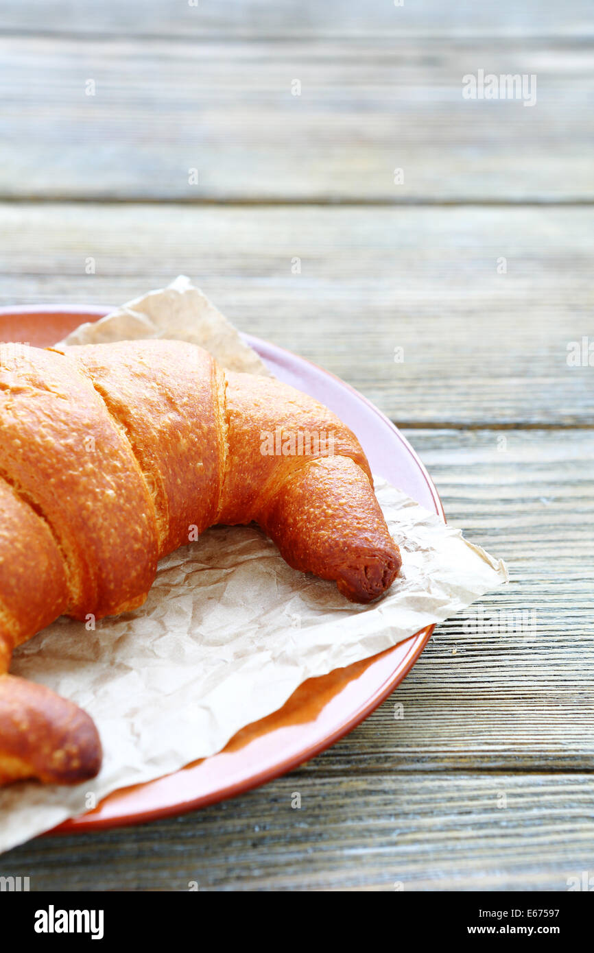 crispy croissant on a plate, food Stock Photo - Alamy