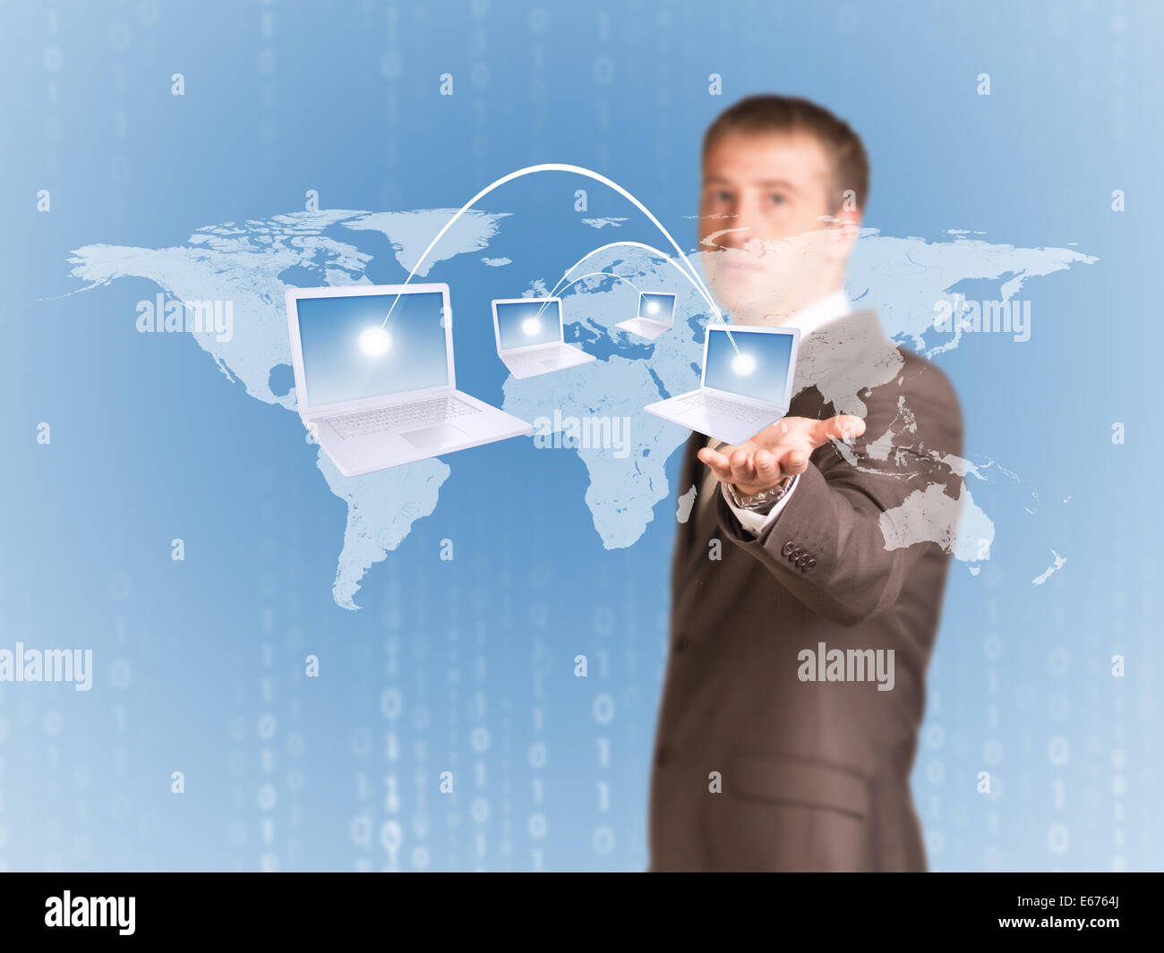 Businessman hold virtual world map with laptops Stock Photo - Alamy
