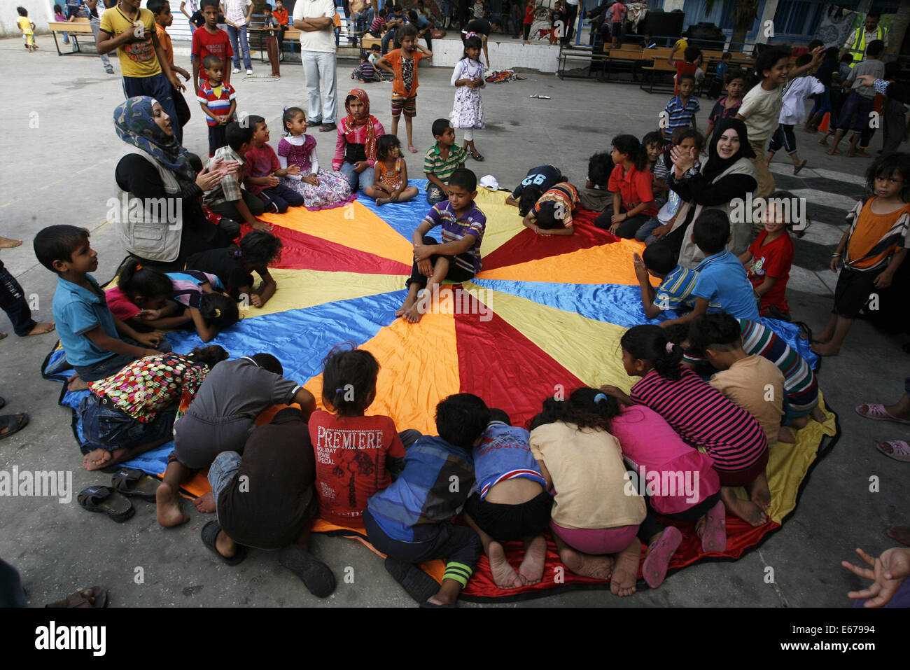 Palestinian children play unrwa school hi-res stock photography and ...