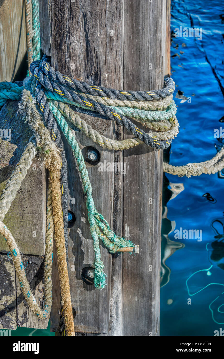 Ropes wound around solid wooden strut of Eden Harbour, Eden NSW ...