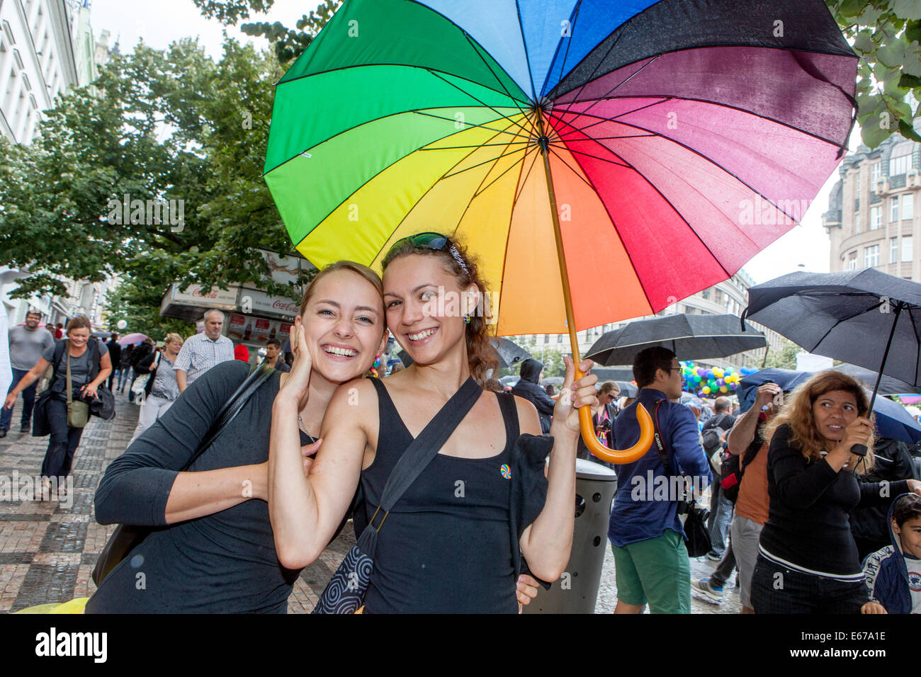 LGBT Women lesbian couple, People with a rainbow umbrella on Prague ...