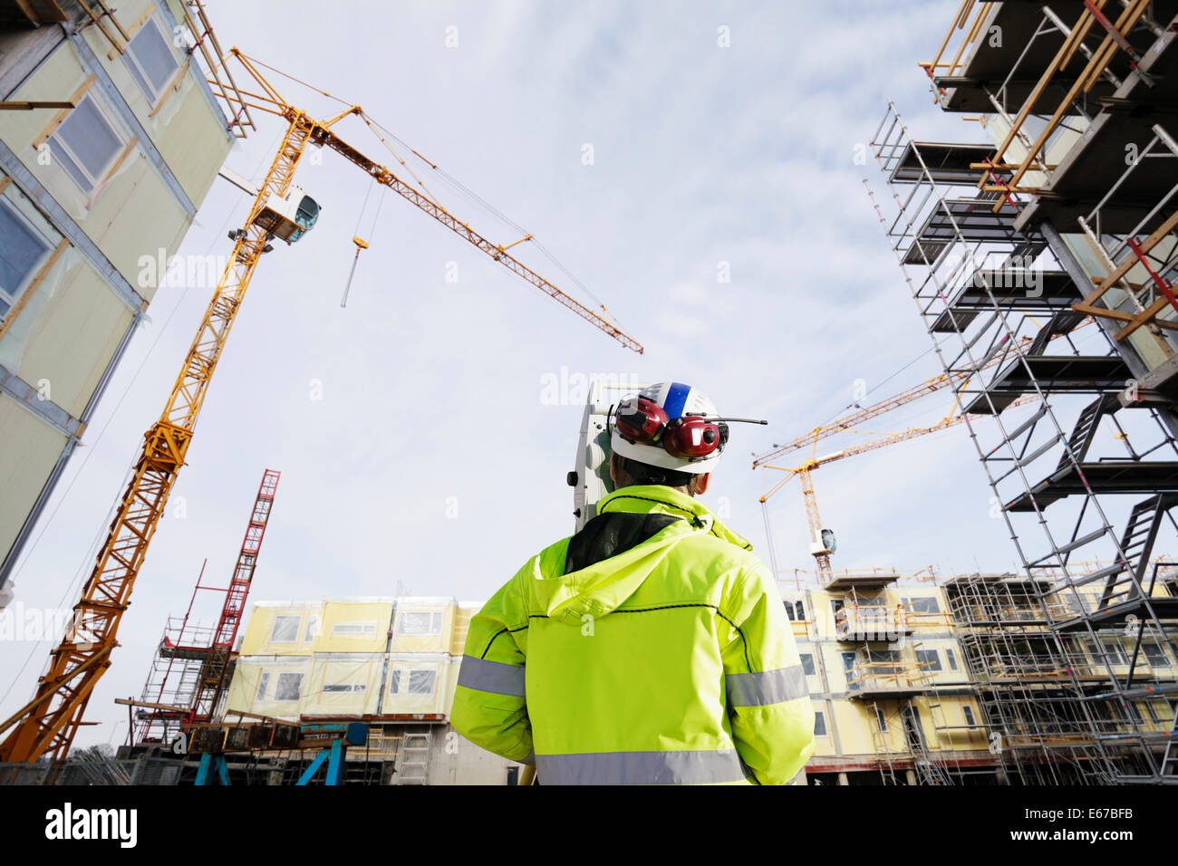 building engineer surveying construction site Stock Photo - Alamy