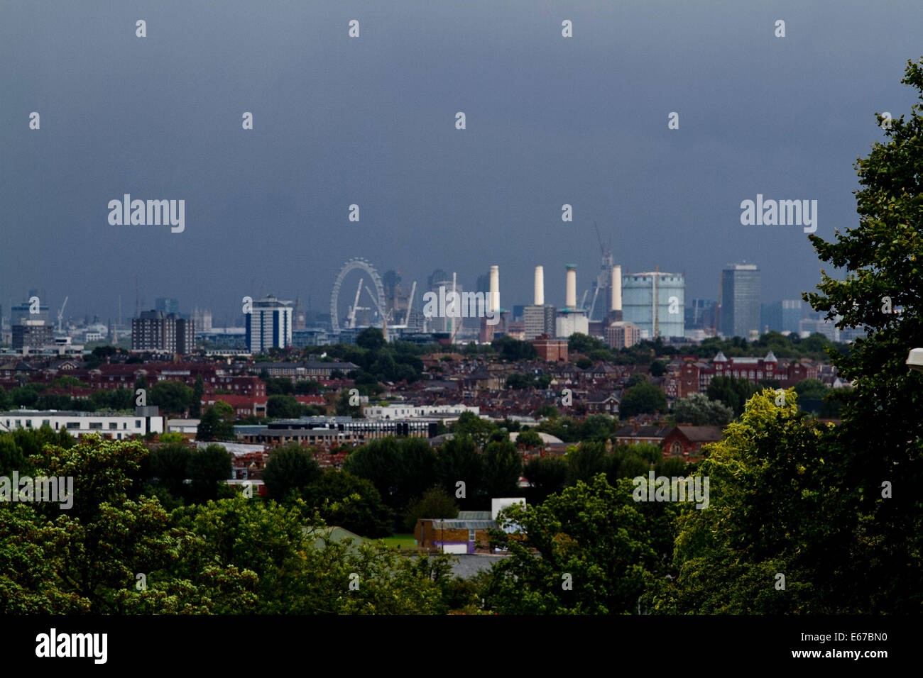 London, UK. 17th August 2014. London skyline turns dark purple as ...