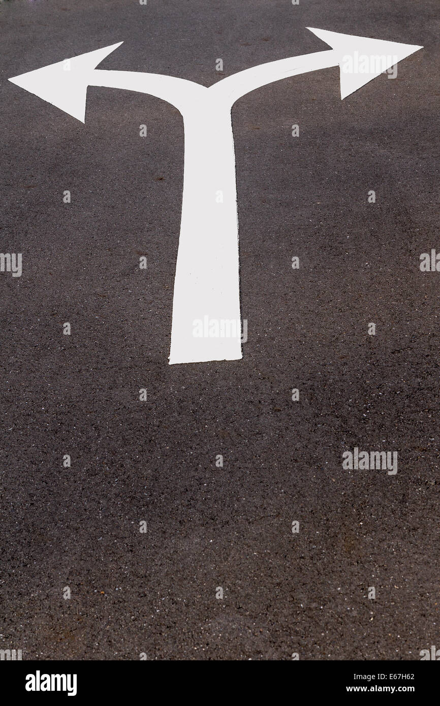 Traffic sign two arrows pointing hi-res stock photography and images ...