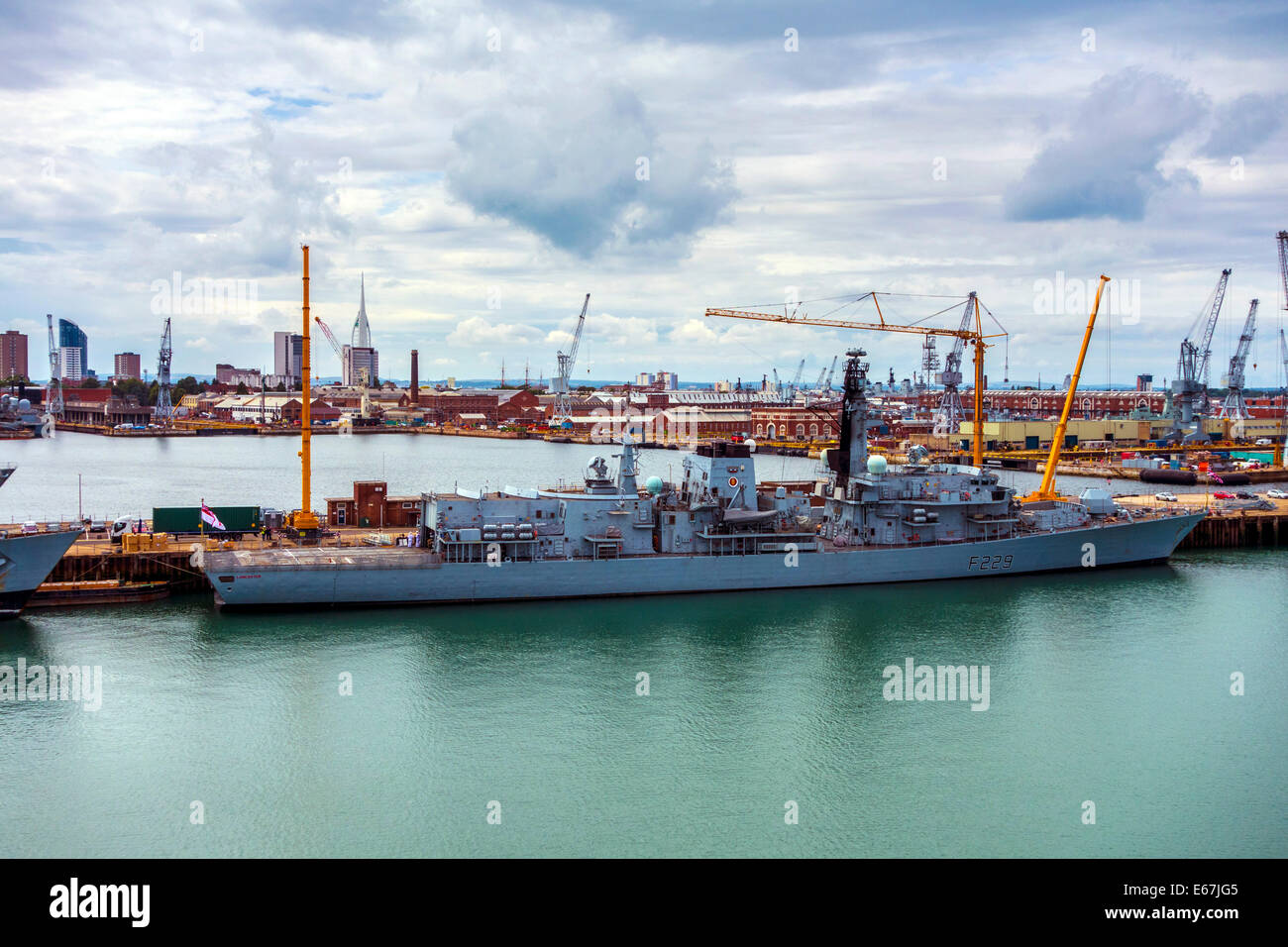 Portsmouth docks and harbour and Royal Navy warships, HMS Lancaster ...