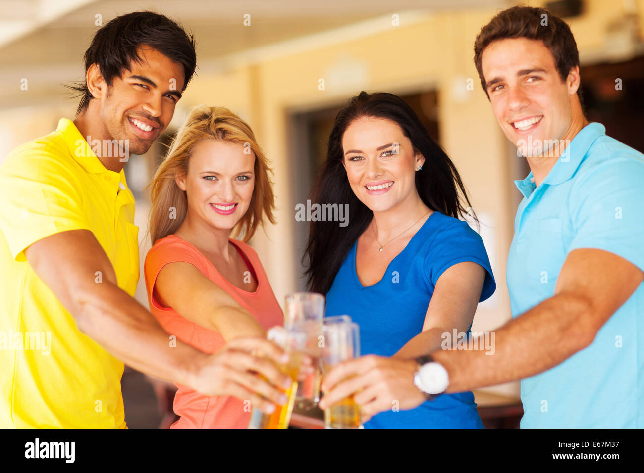 group of happy friends having drinks at a party Stock Photo - Alamy