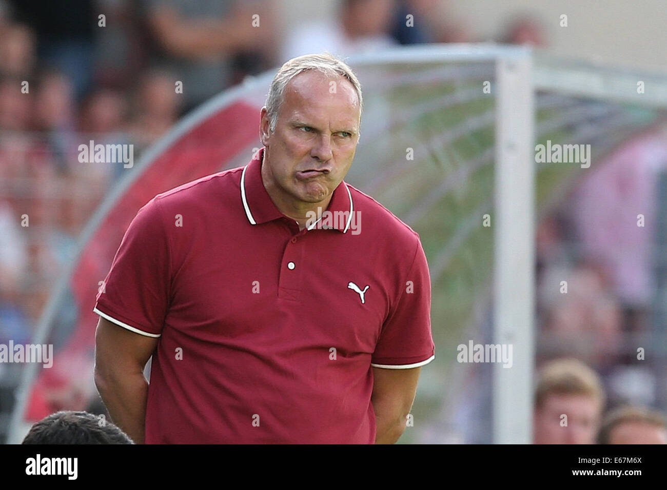 Duesseldorf's coach Oliver Reck monitors the action on the pitch during ...