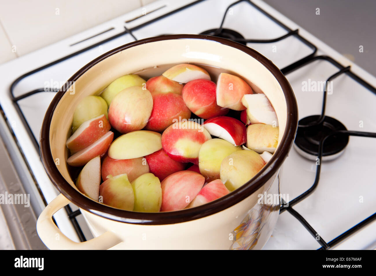 Red apple stewed fruit juice or compote Stock Photo - Alamy