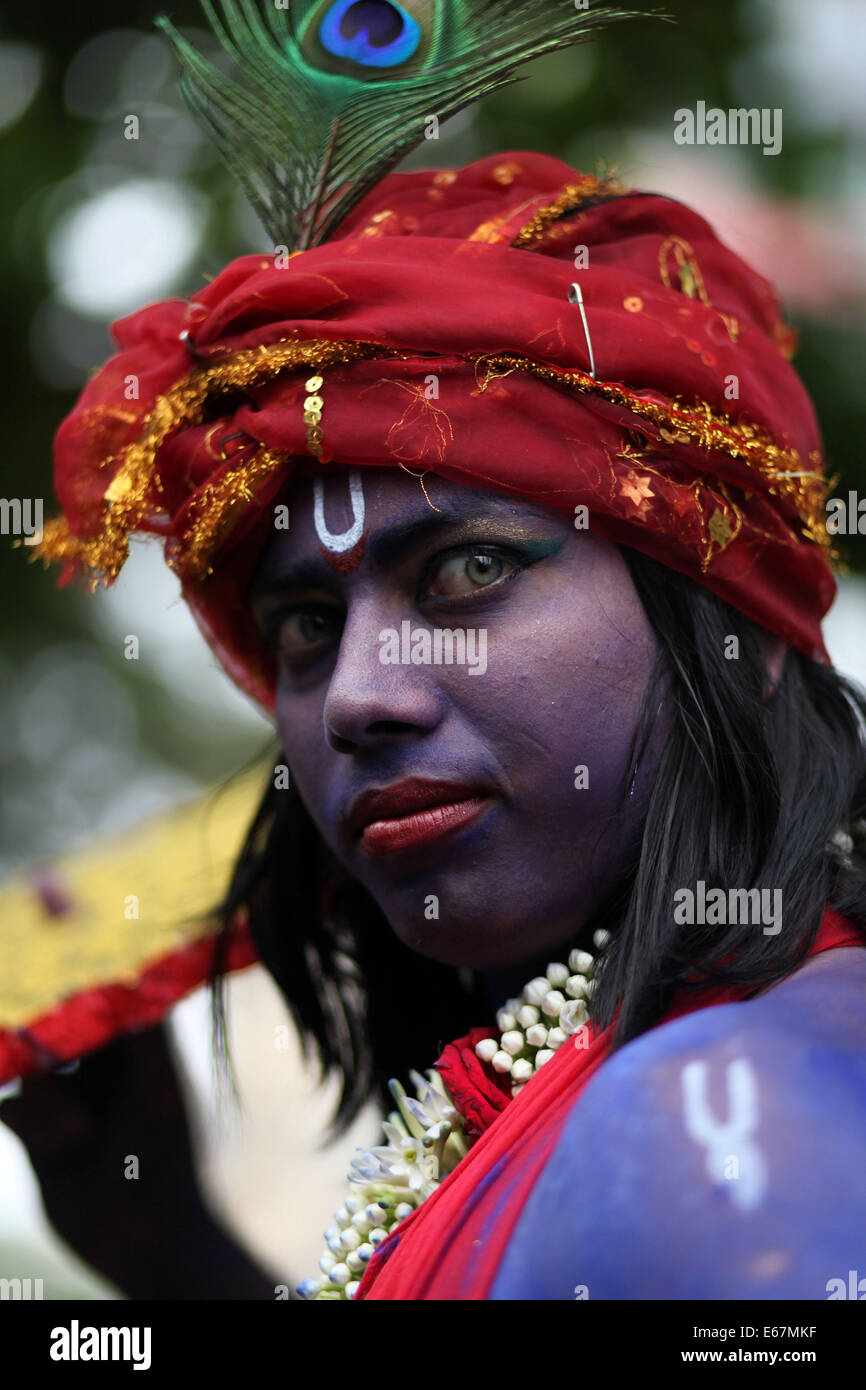 A Bangladeshi Hindu boy dressed like Lord Sri Krishna take part in the ...