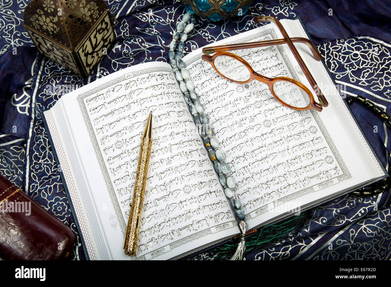 The Quran is the bible for Muslims Stock Photo - Alamy