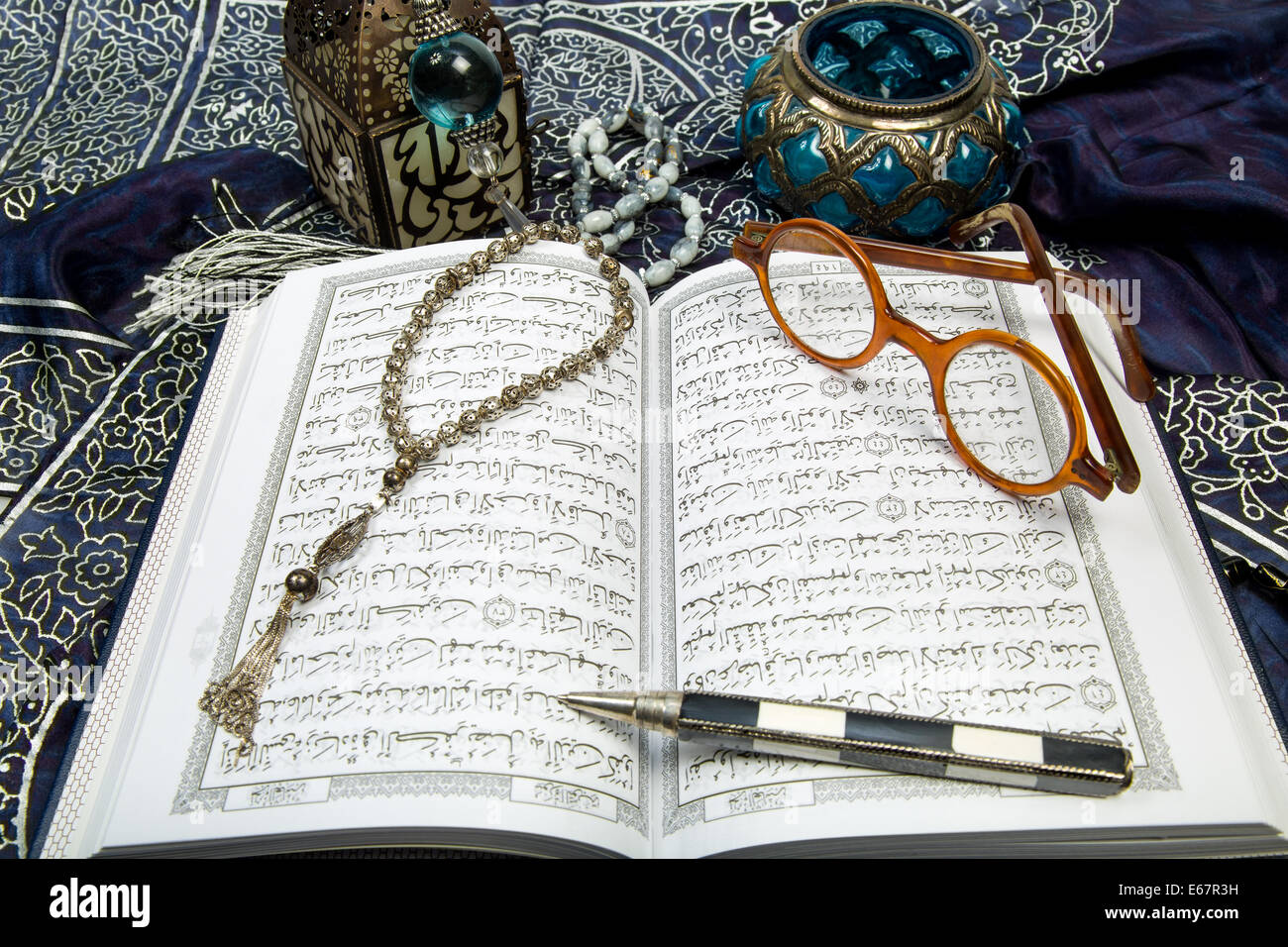 The Quran is the bible for Muslims Stock Photo - Alamy