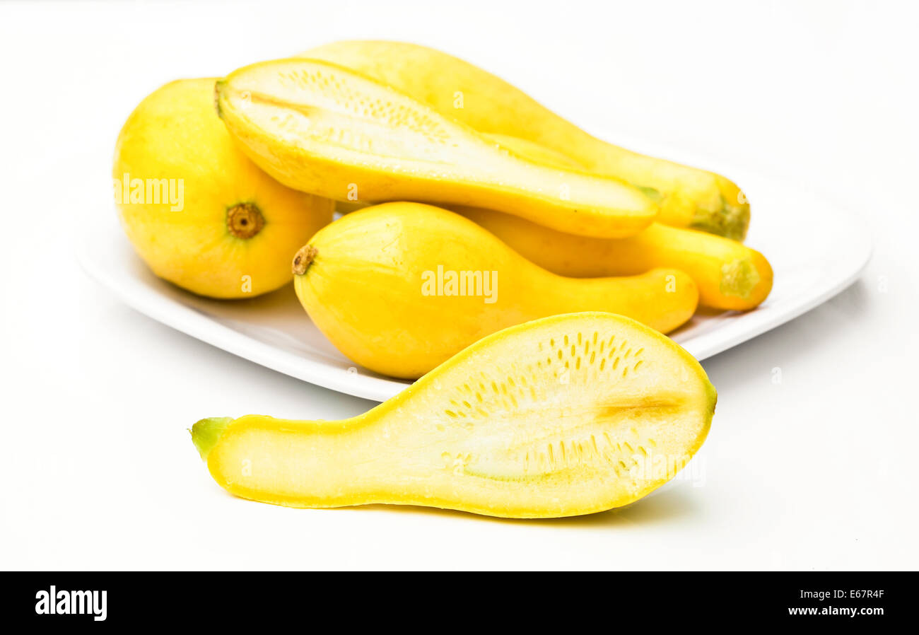 Yellow squashes on white background Stock Photo - Alamy