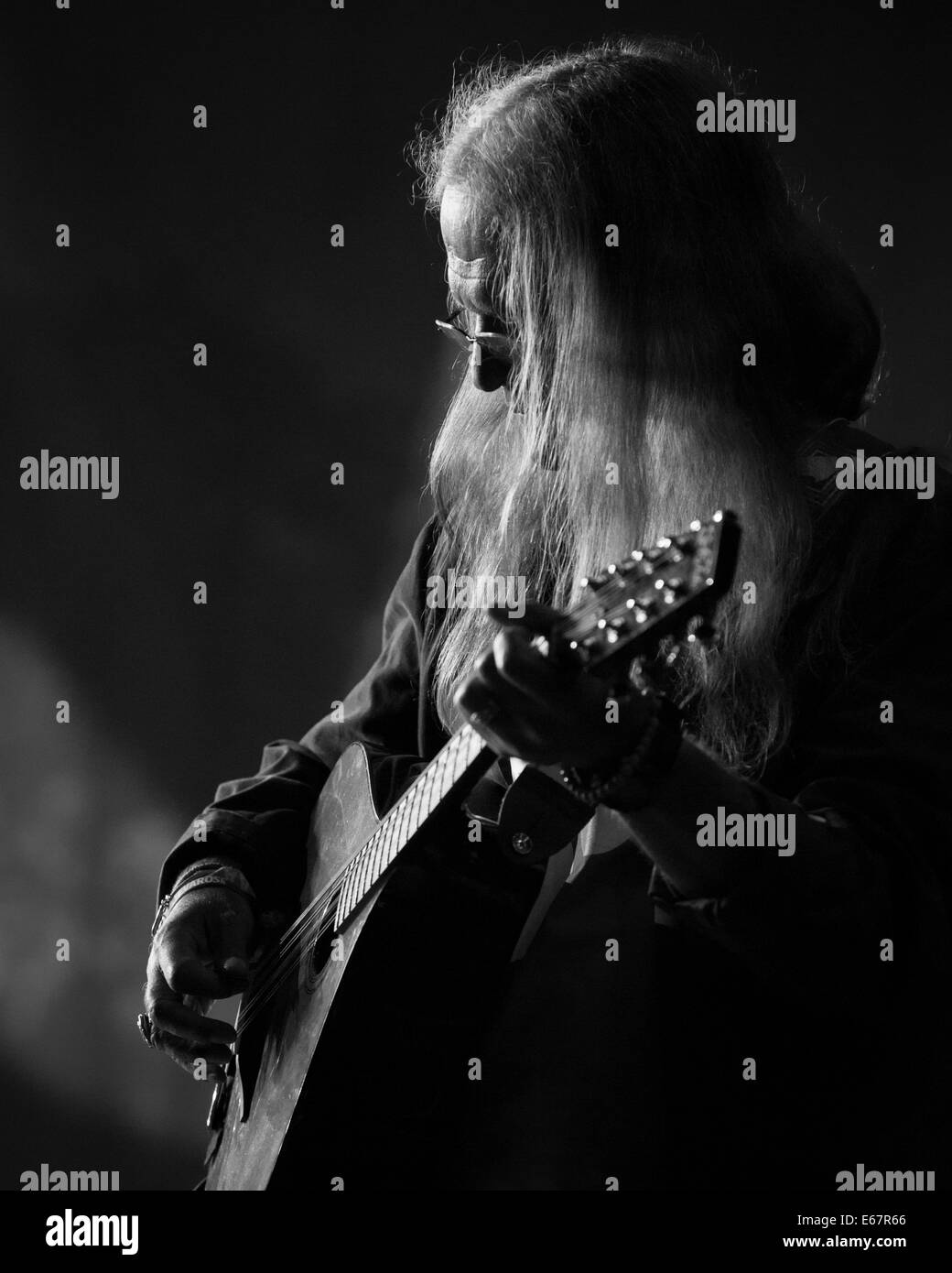 Chris Leslie of Fairport Convention playing a mondolin on stage at ...