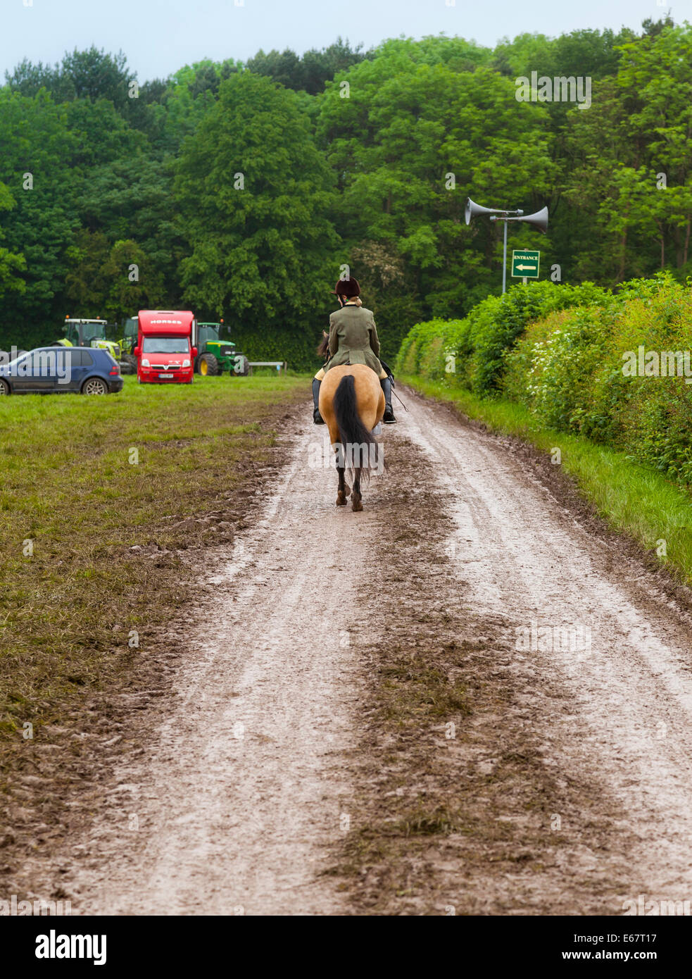 Staffordshire County Show, England, 2014. Woman riding horse towards ...