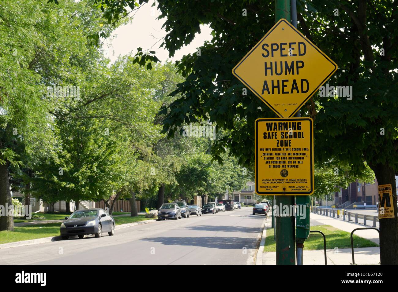 Speed hump ahead and safe school zone warning sign, Chicago, Illinois ...