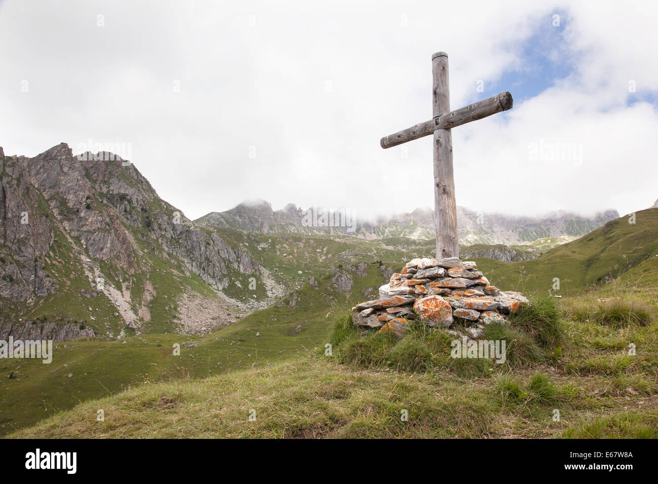 wooden cross in mountains of the french region haute savoie Stock Photo ...
