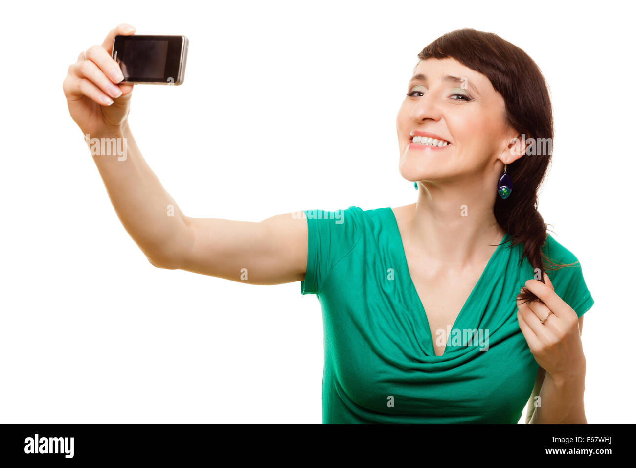 Technology and internet concept - smiling woman taking self picture ...
