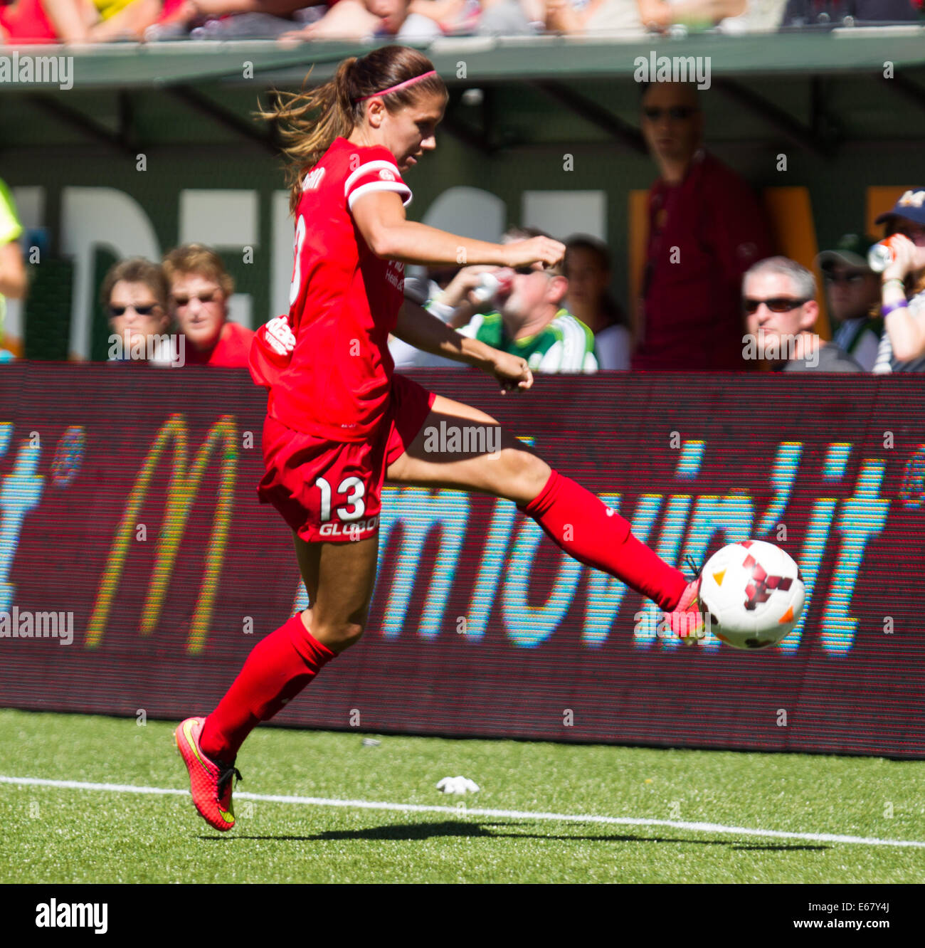 Portland, Oregon, USA. 17th Aug, 2014. ALEX MORGAN (13) controls the ...