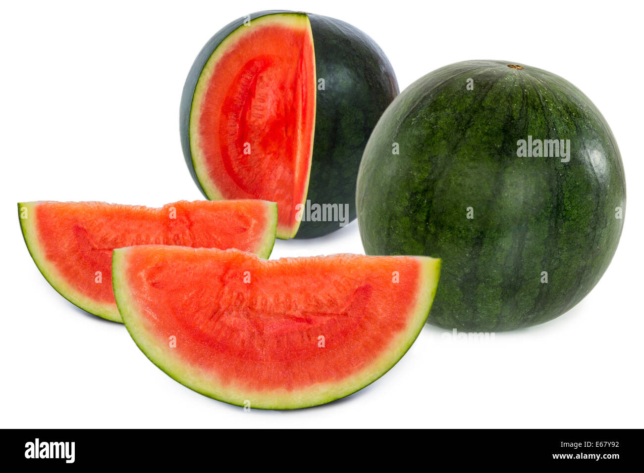 Two watermelons one with slices missing and two cut out slices isolated ...