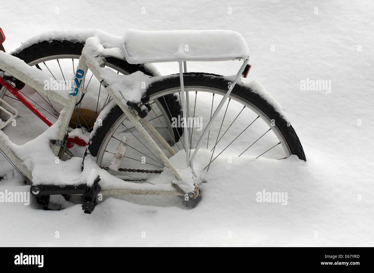Bicycle stuck into deep snow hi-res stock photography and images - Alamy