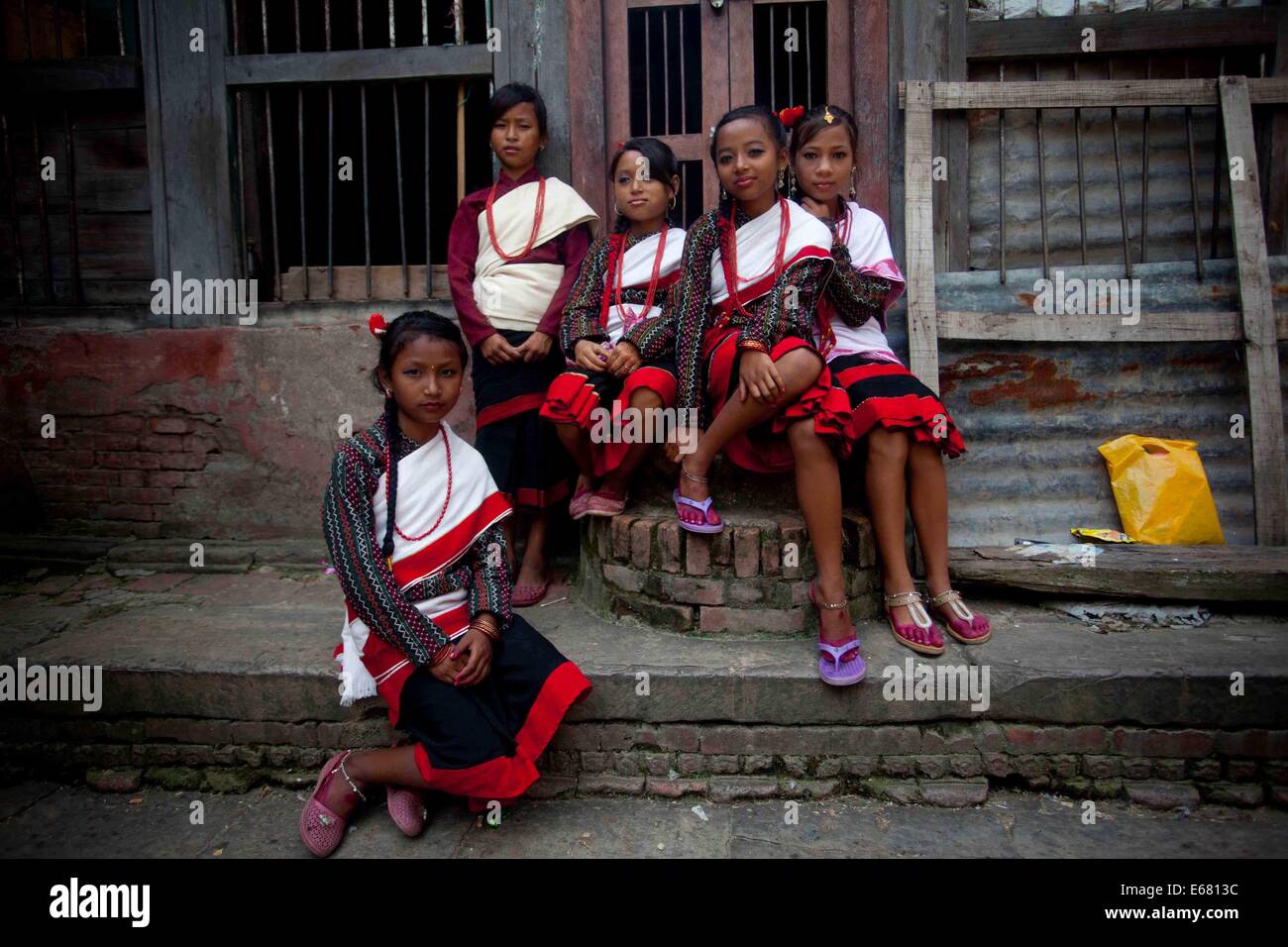 Bhaktapur, Nepal. 17th Aug, 2014. Nepalese Newari girls pose for photos ...