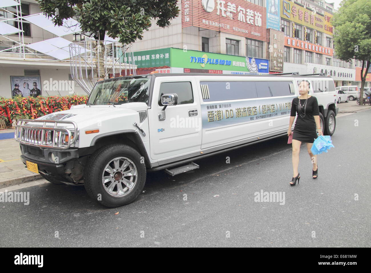 Aug. 17, 2014 - SHAOXING CHINA AUG 17: A Hummer Limo in on the road of ...