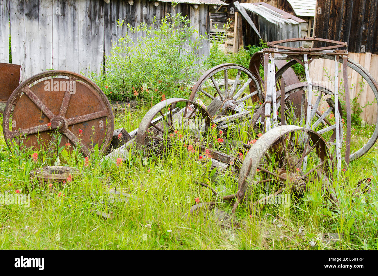 Old rusted machinery farm equipment wagon wheel historic old gold rush ...