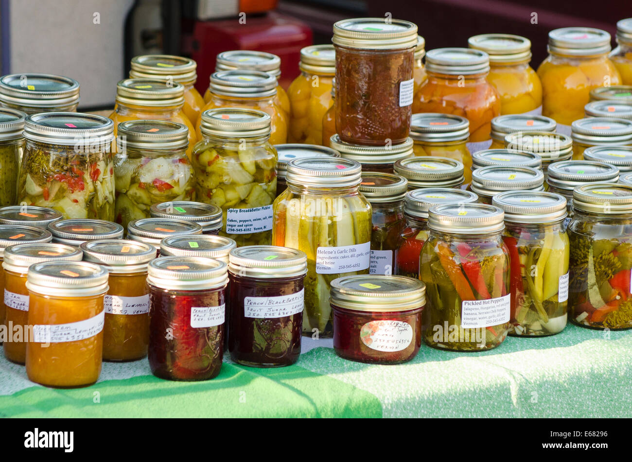 Homemade pickled preserves in jars at the farmers market Okanagan ...