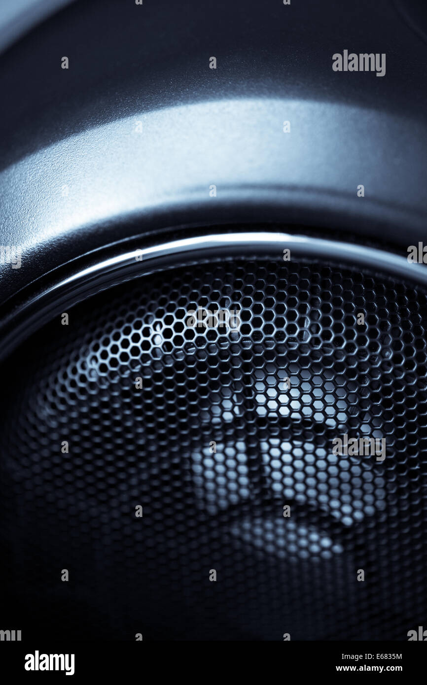Close up shot of a round speaker in a car Stock Photo - Alamy