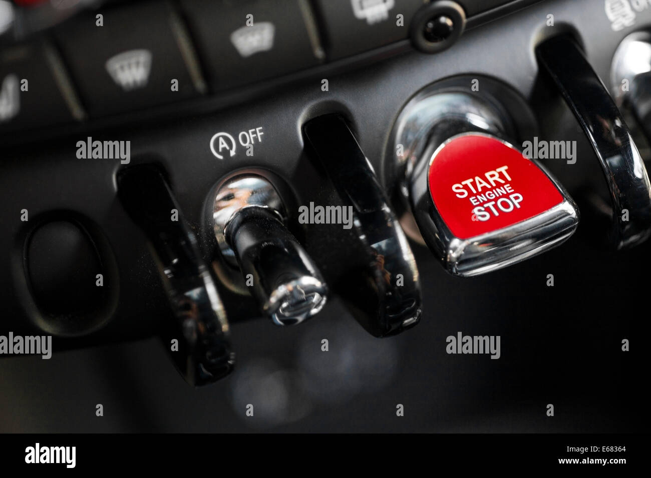 Detail on a red start button in a car Stock Photo - Alamy
