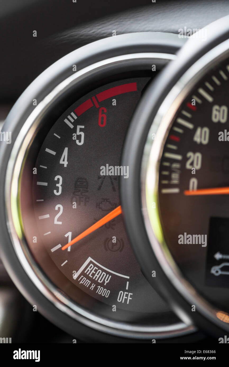 Detail of a tachometer in a car Stock Photo - Alamy