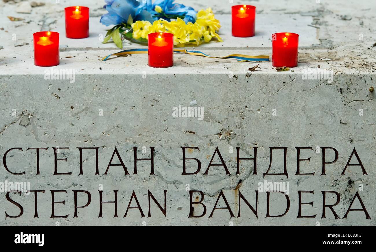 A floral wreath in the national colours of the Ukraine lie on top of ...