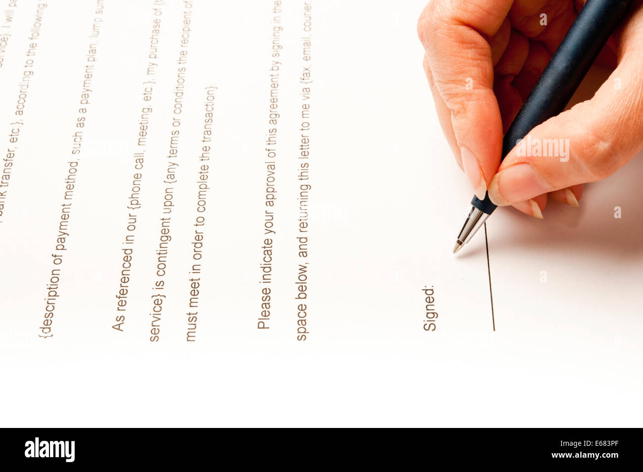 Woman sign a contract hi-res stock photography and images - Alamy